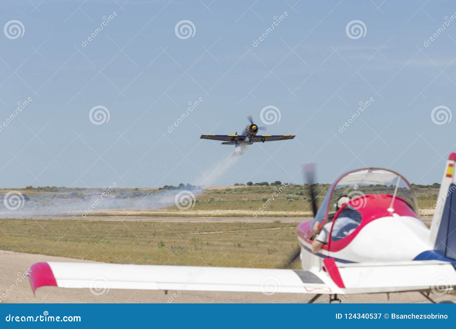 Acrobatic plane pass stock image. Image of propeller - 124340537