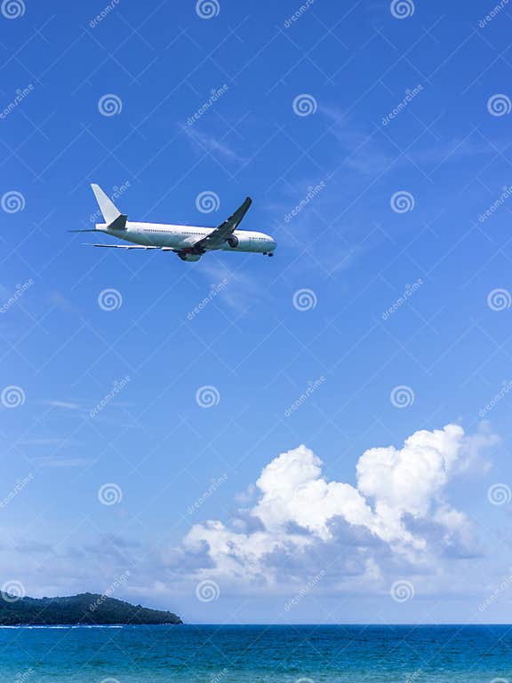 Plane fly over the sea stock photo. Image of beautiful - 97551984