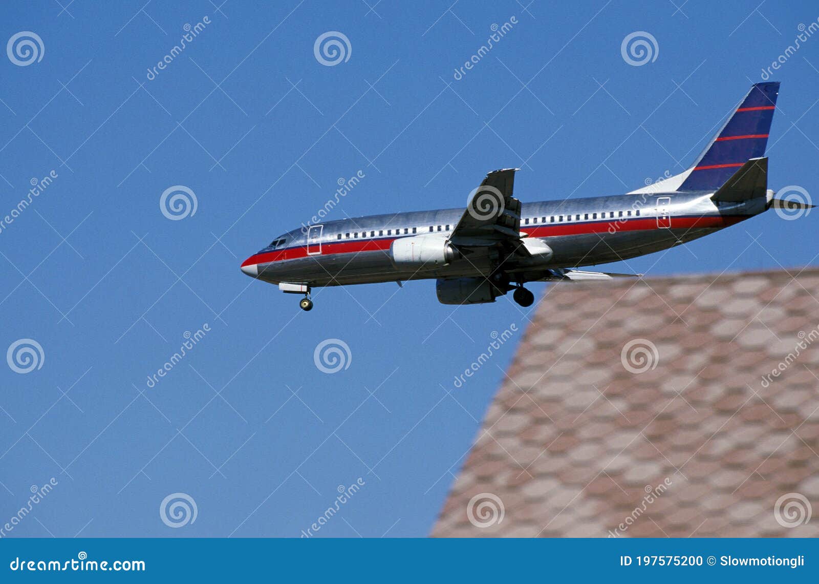 Plane Flying Above a House, Symbolic Image for Noise Stock Photo ...