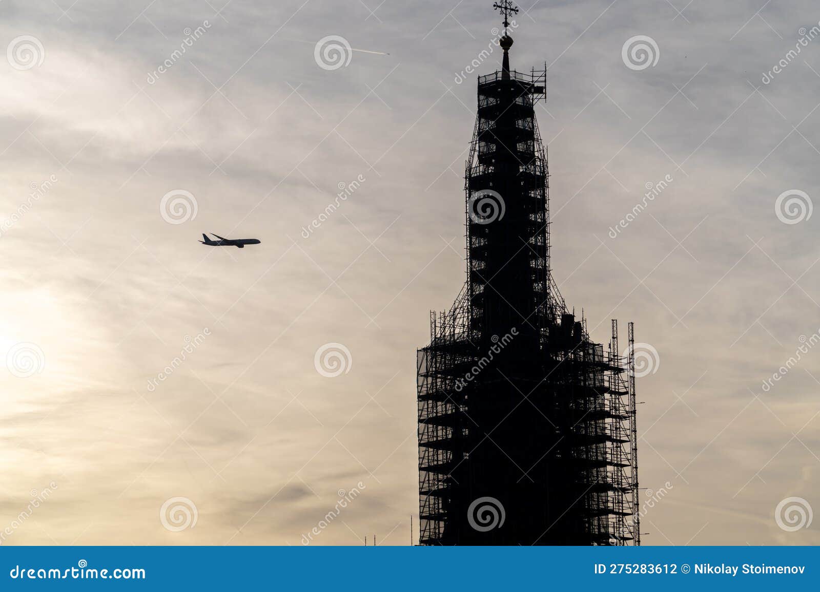Plane Flying into a Building Under Construction Stock Photo - Image of ...