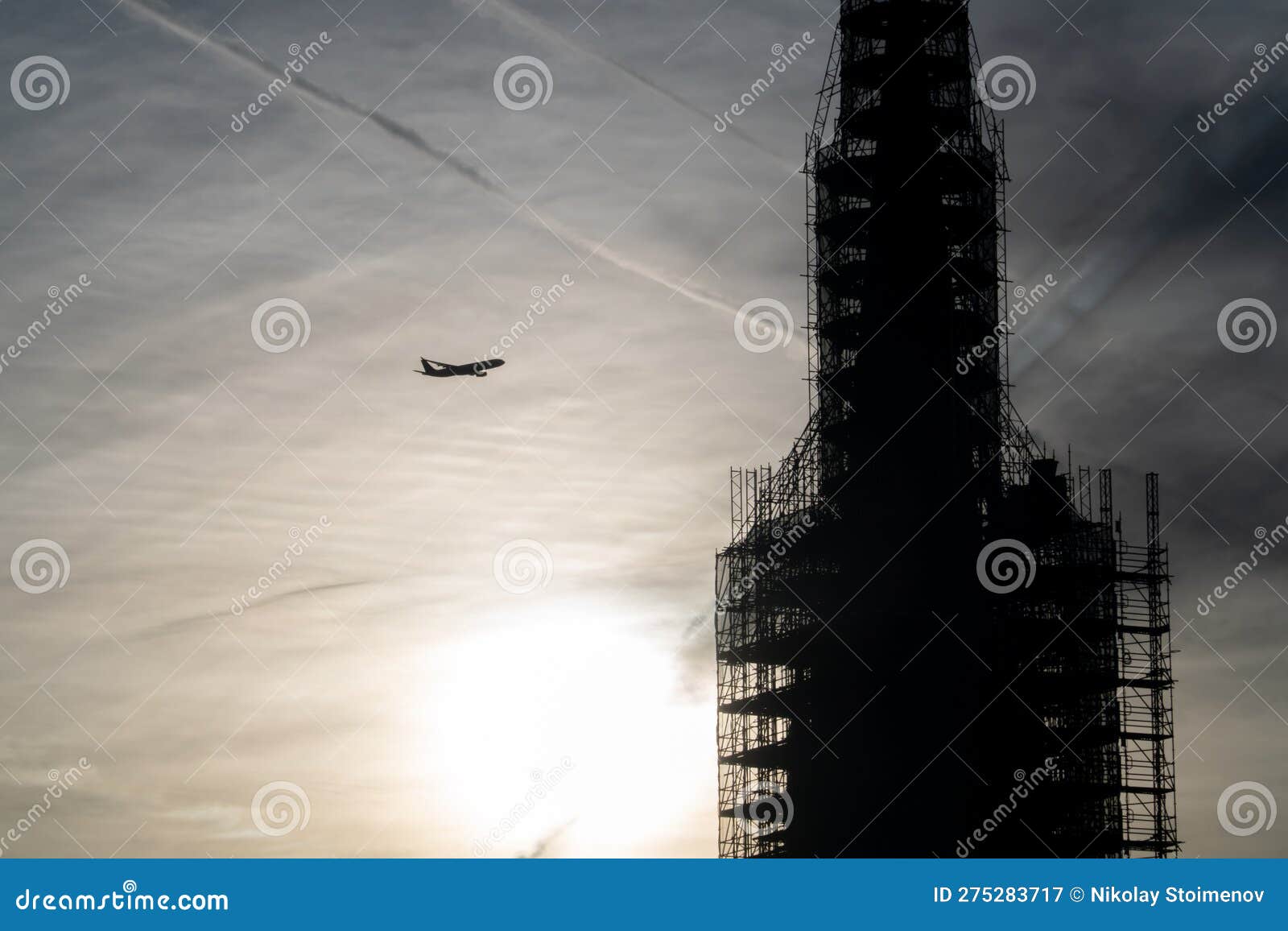 Plane Flying into a Building Under Construction Stock Image - Image of ...