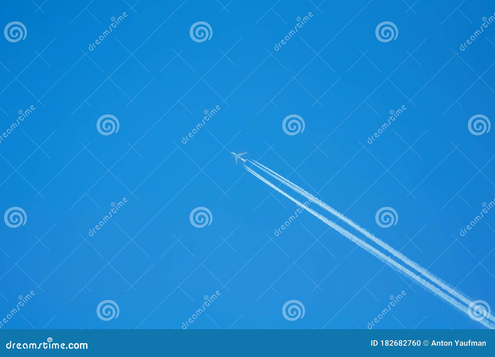 A Plane Flying in a Clear Sky Stock Photo - Image of sunny, journey ...