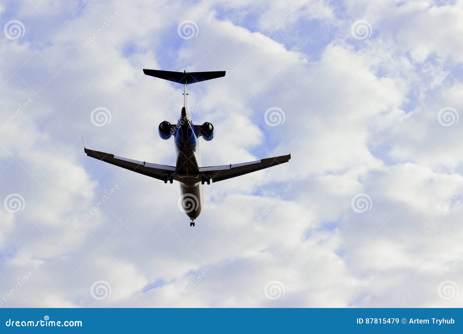 Plane Flying through Clouds in the Sky. Jet Aircraft. Stock Image ...