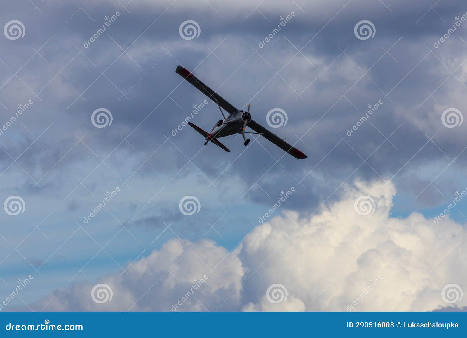 Plane Flying on Cloudy Sky from Side. Aviation Background Stock Photo ...