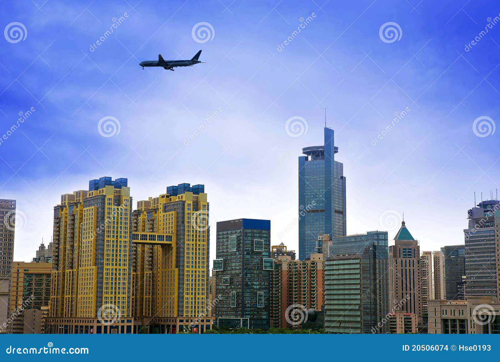 Plane flying over city stock photo. Image of high, downtown - 20506074