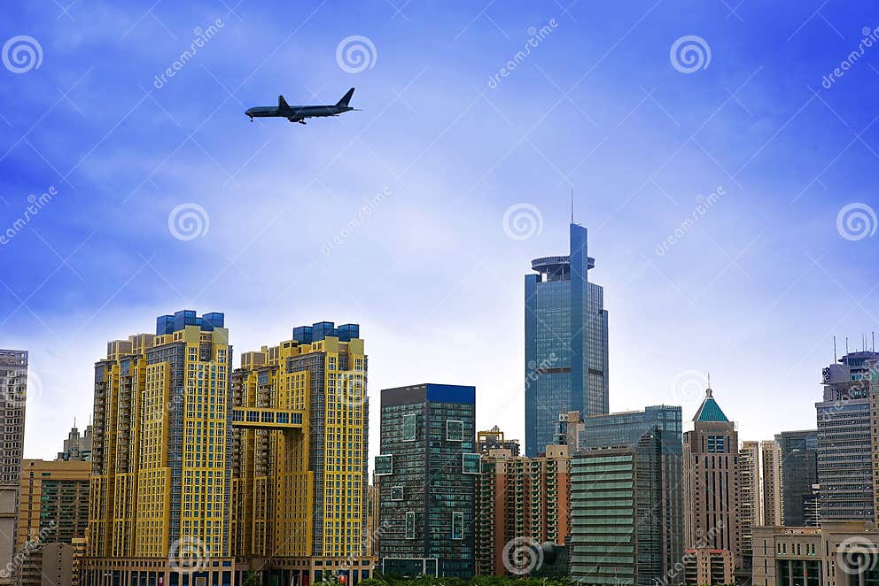 Plane flying over city stock photo. Image of high, downtown - 20506074