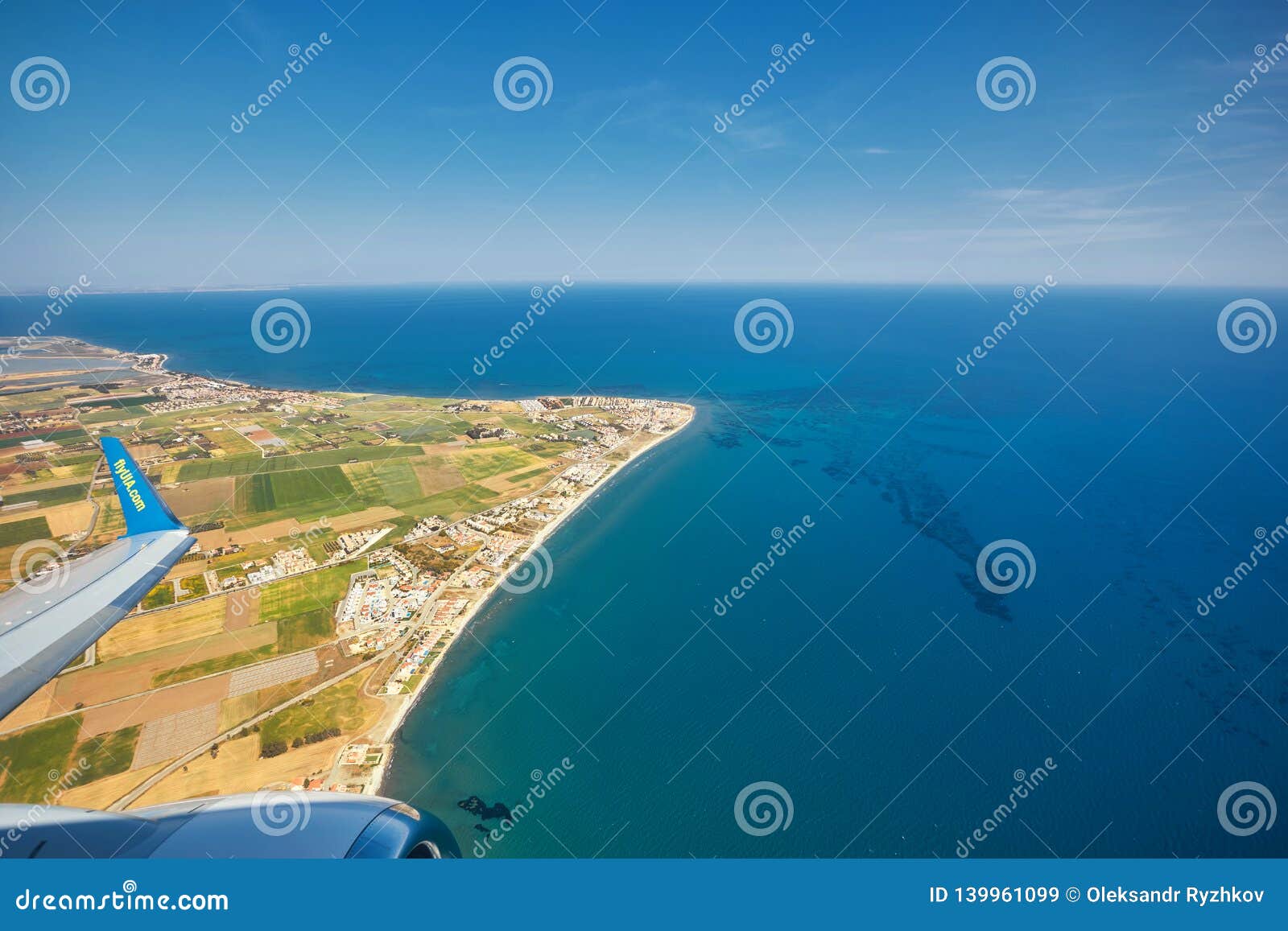 Plane is Flying Over the Island of Cyprus. Airplane Wing in Flight from ...