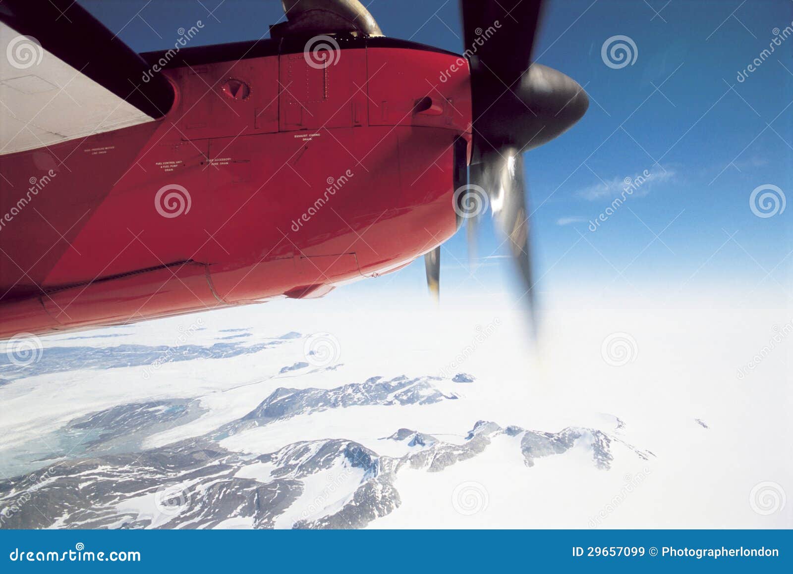 Plane Flying Over Landscape Stock Image - Image of motion, climate ...