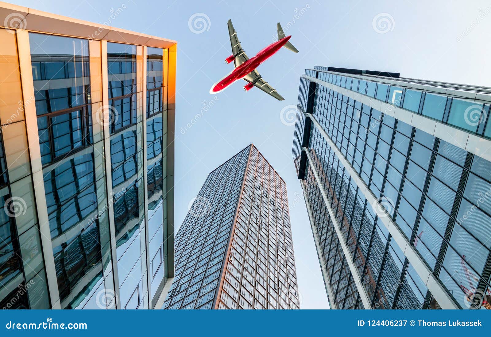 Plane Flying Over Skyscraper in the City of Frankfurt, Germany Stock ...
