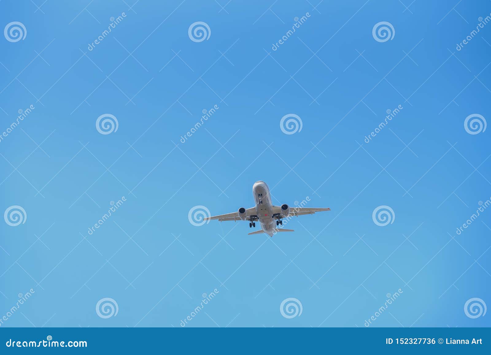 The Plane Flying in the Sky a Close Up the Bottom View Stock Photo ...