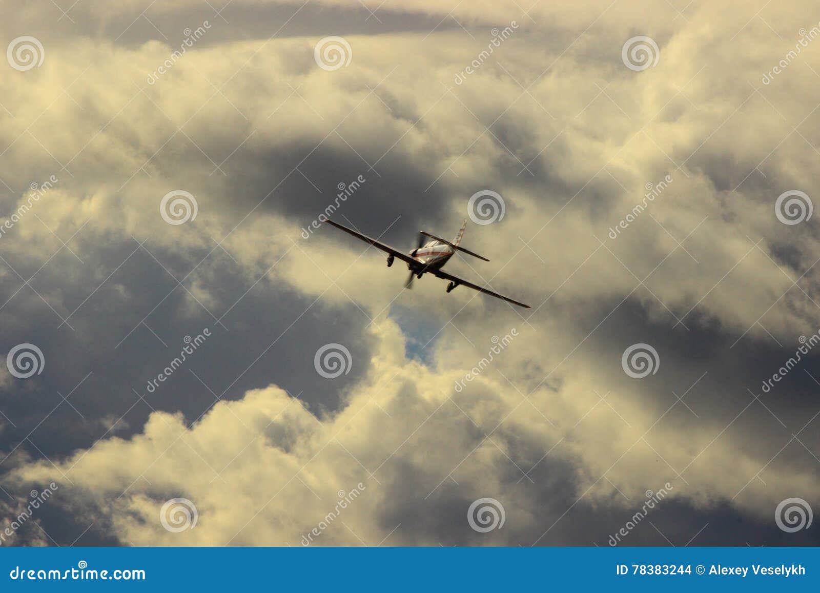 The Plane Flying in Storm Clouds Stock Photo - Image of rarity ...