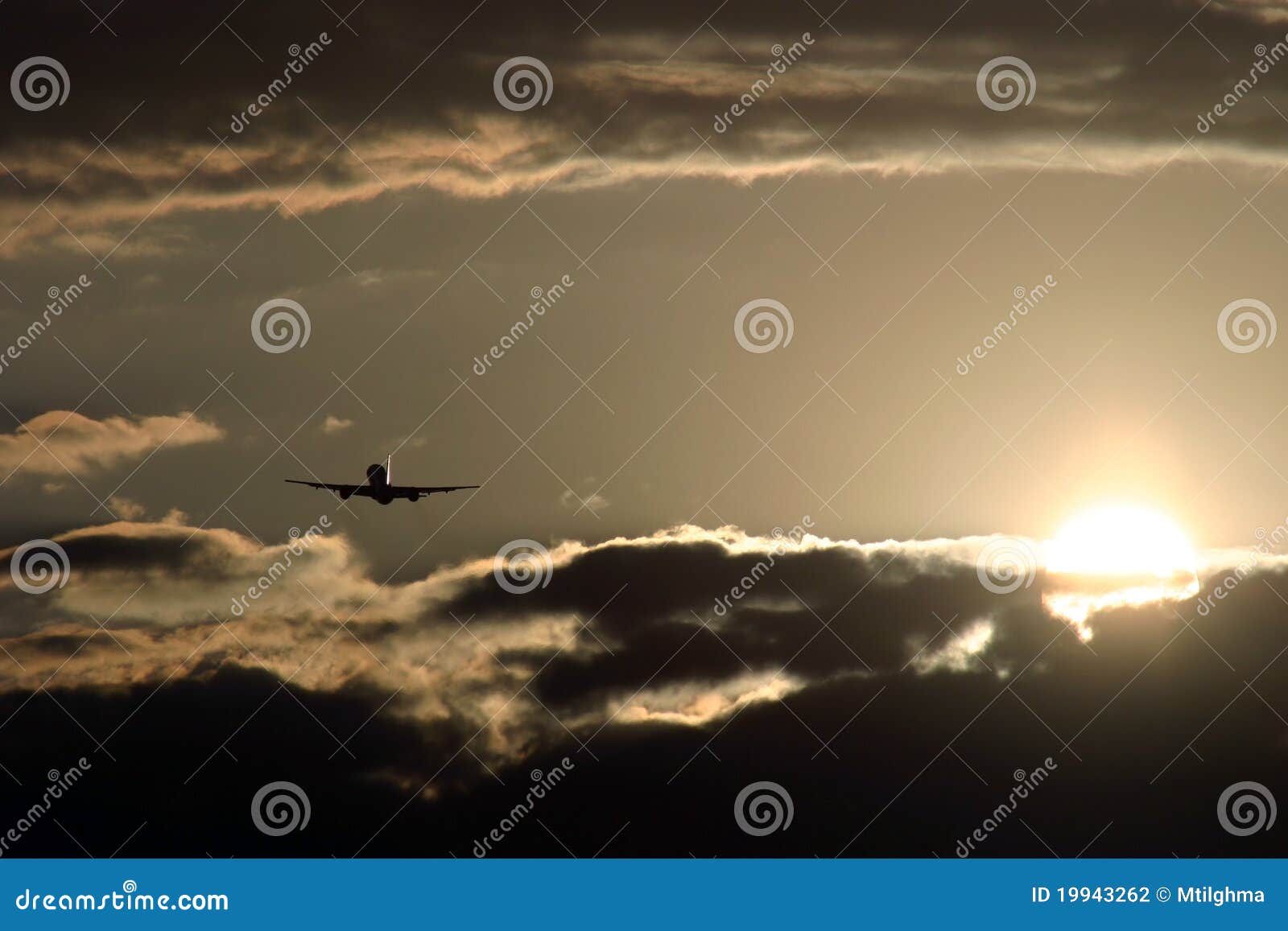 Plane Flying into Sunset stock photo. Image of transportation - 19943262