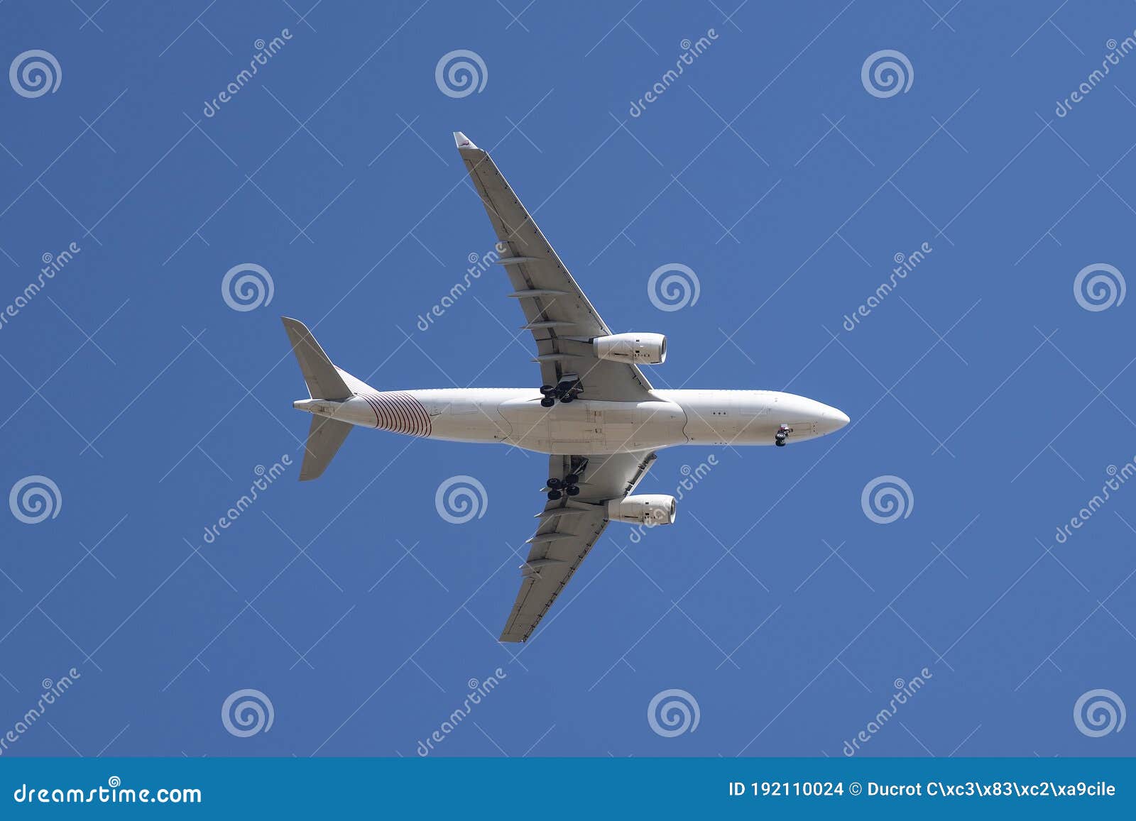 Plane in full flight stock photo. Image of airborne - 192110024
