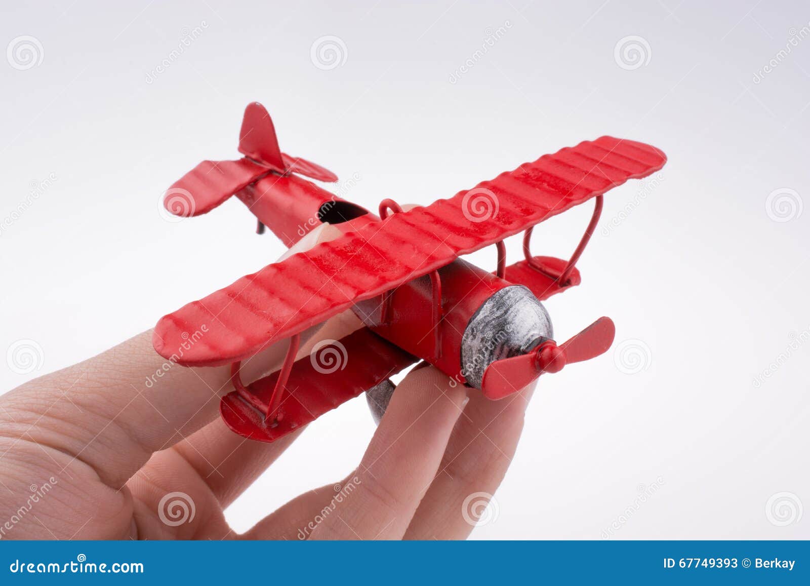 Plane in hand stock image. Image of flight, model, concept - 67749393
