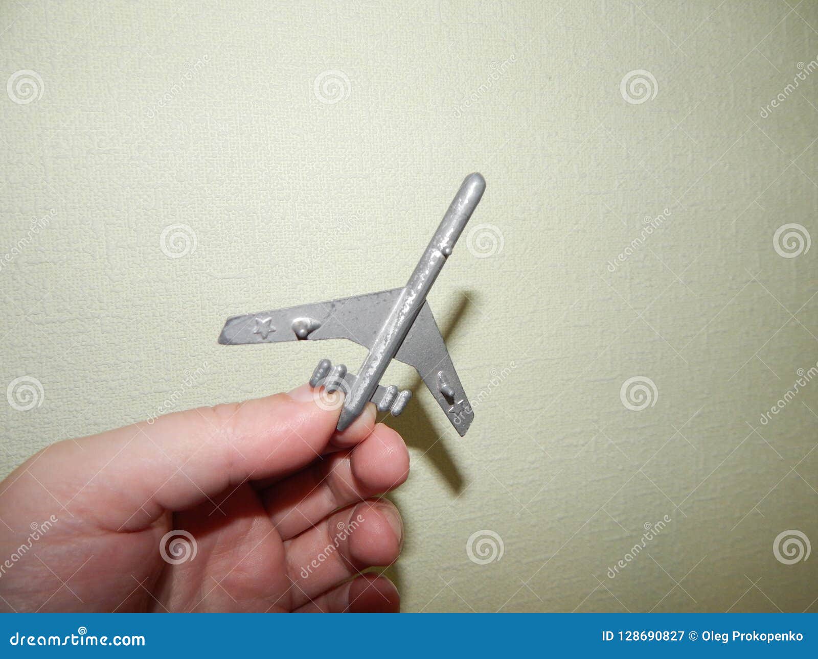 The Plane in the Hand of a Man Rise and Fall Stock Image - Image of ...