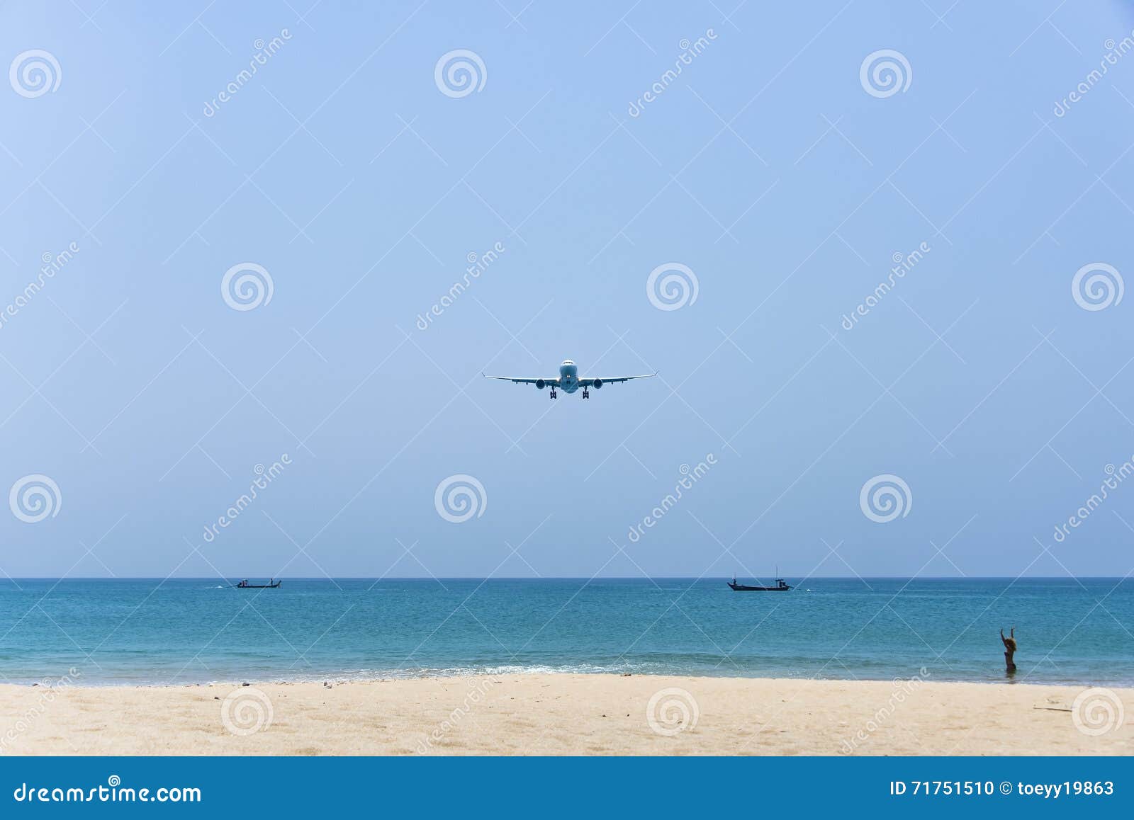 Plane is Landing Over the Beach Stock Photo - Image of ocean, tourism ...