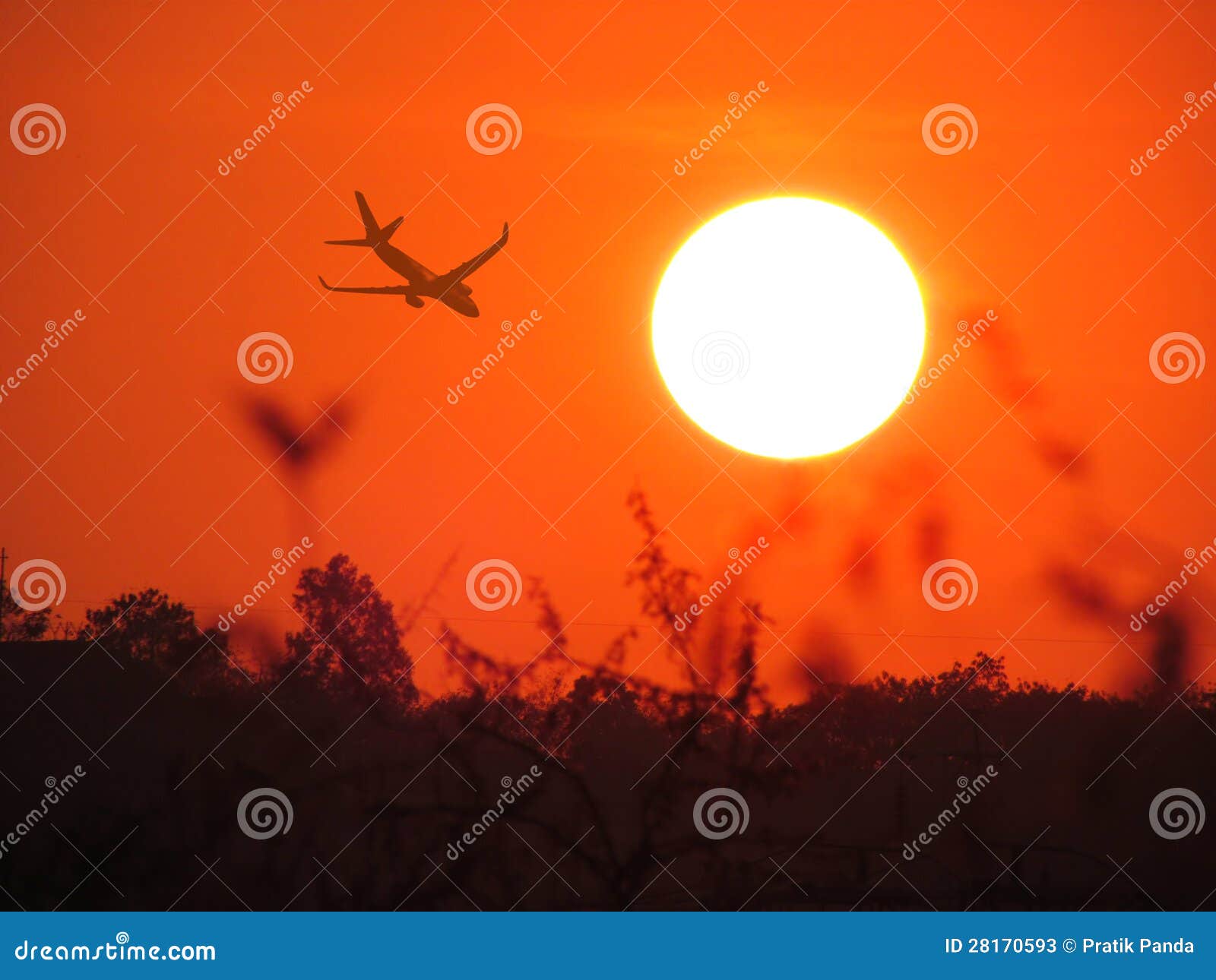 Plane Landing Over Setting Sun Background Stock Image - Image of ...