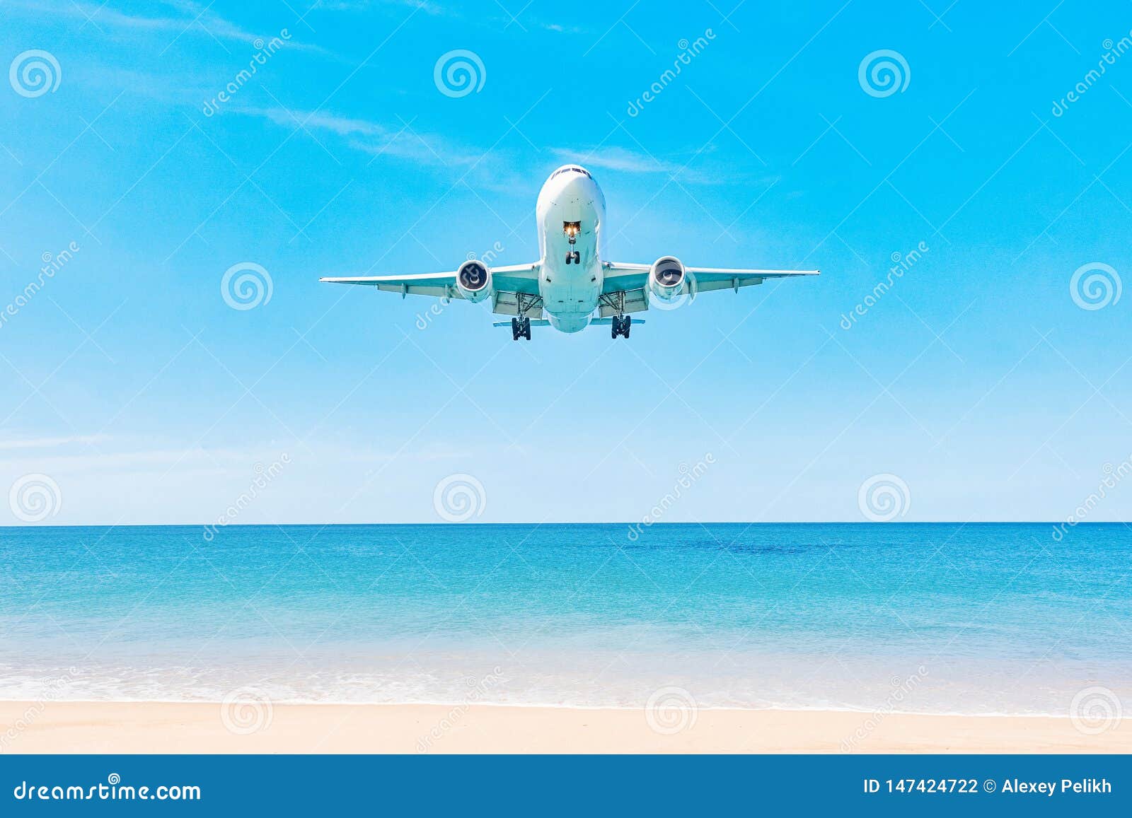 Plane Landing Over the Ocean Stock Photo - Image of plane, airplane ...