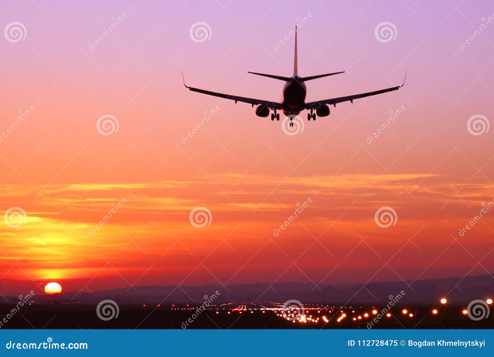 The Plane Lands at Dusk at Sunset Stock Image - Image of beautiful ...
