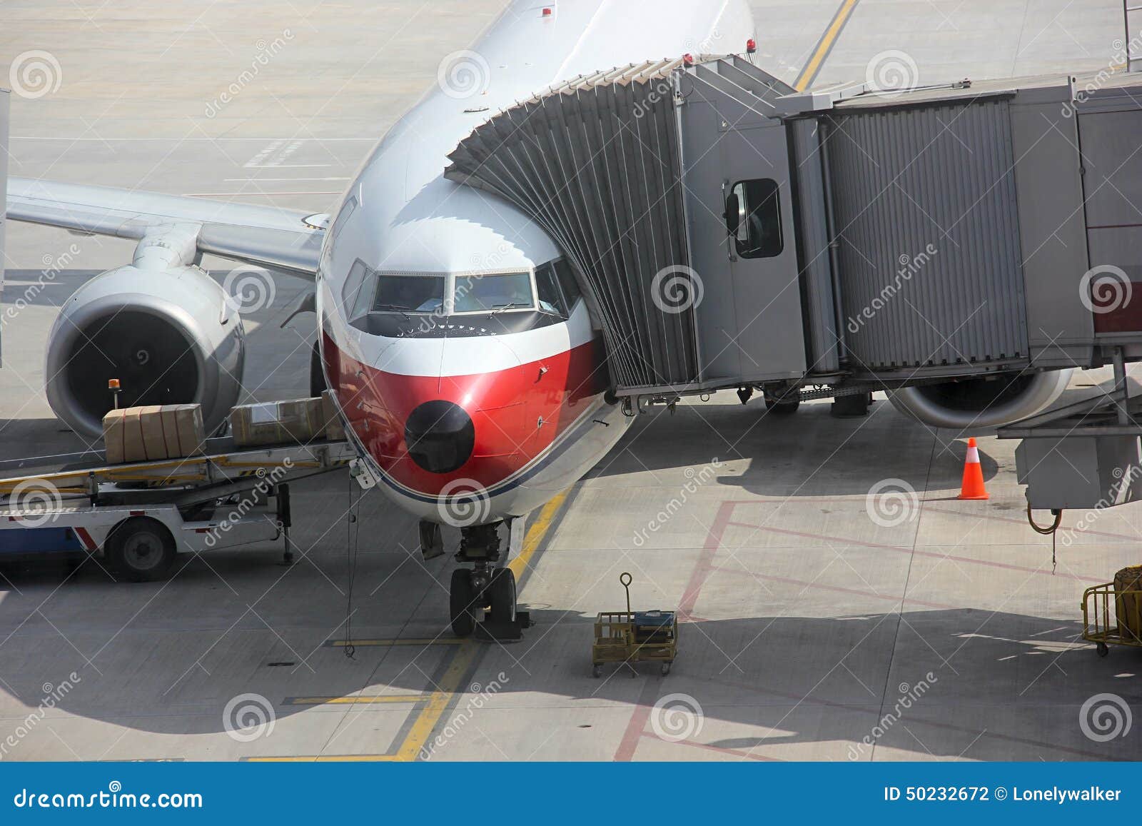 Plane Loading Cargo and Passengers Boarding Stock Photo - Image of ...