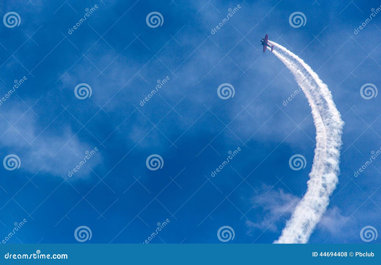 Plane looping stock photo. Image of smoke, clouds, stream - 44694408