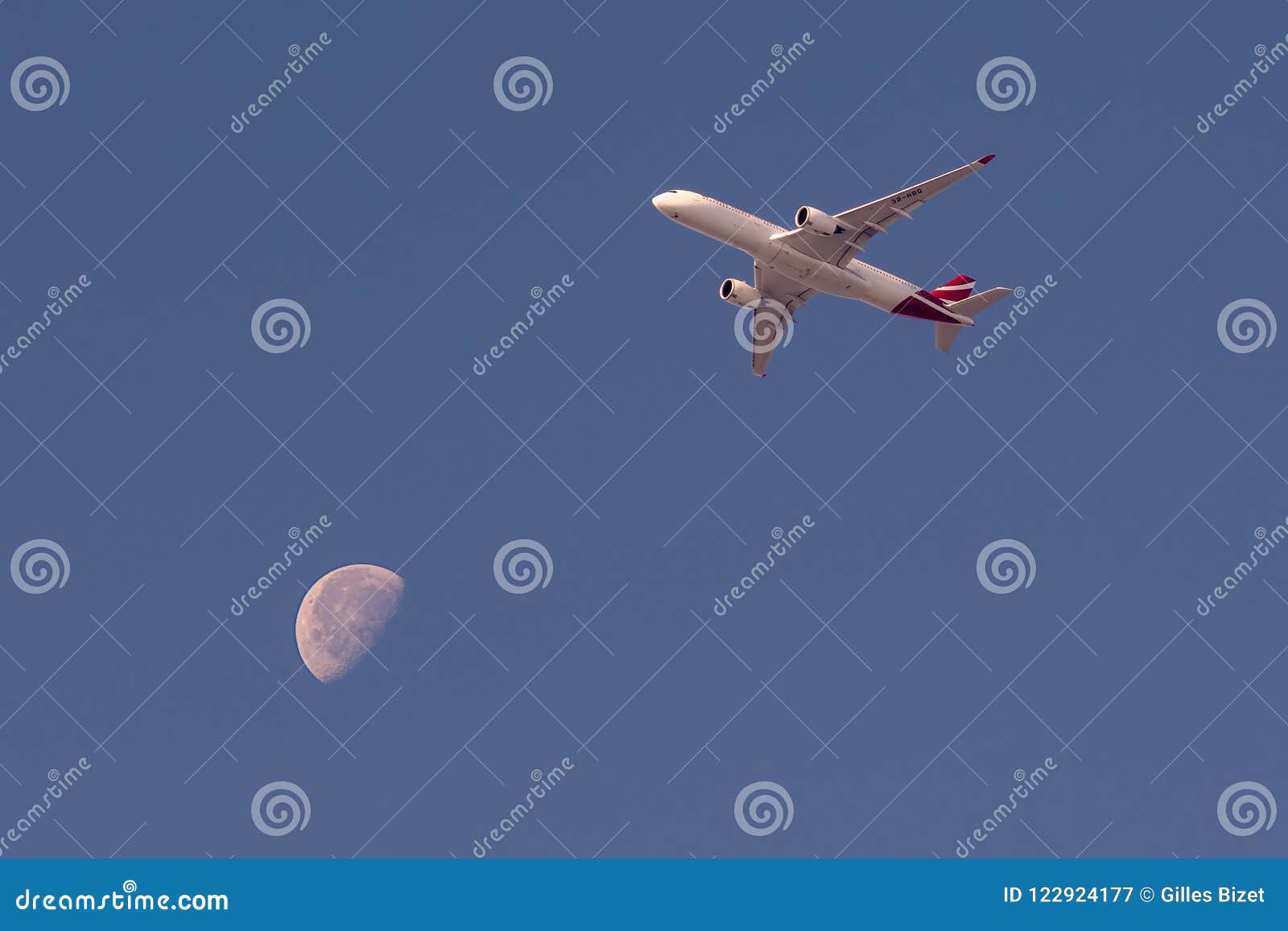 AIRLINER AND MOON Editorial Photo | CartoonDealer.com #12698503