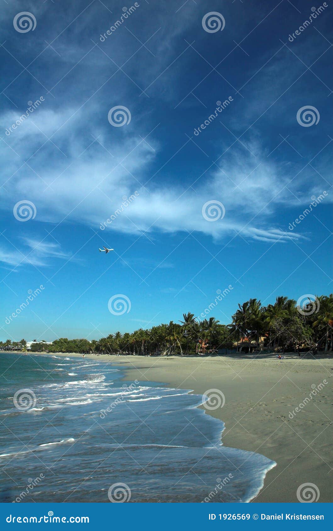A plane over a beach stock image. Image of paradise, plata - 1926569