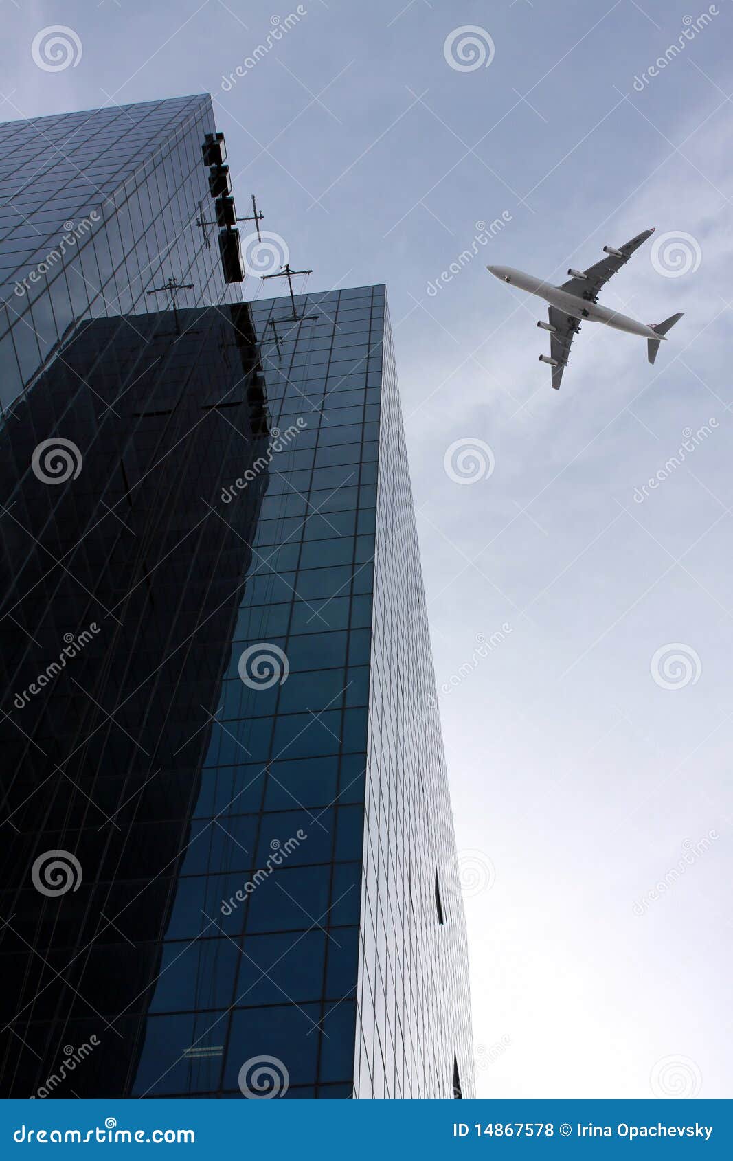 Plane over a city stock photo. Image of plane, daytime - 14867578