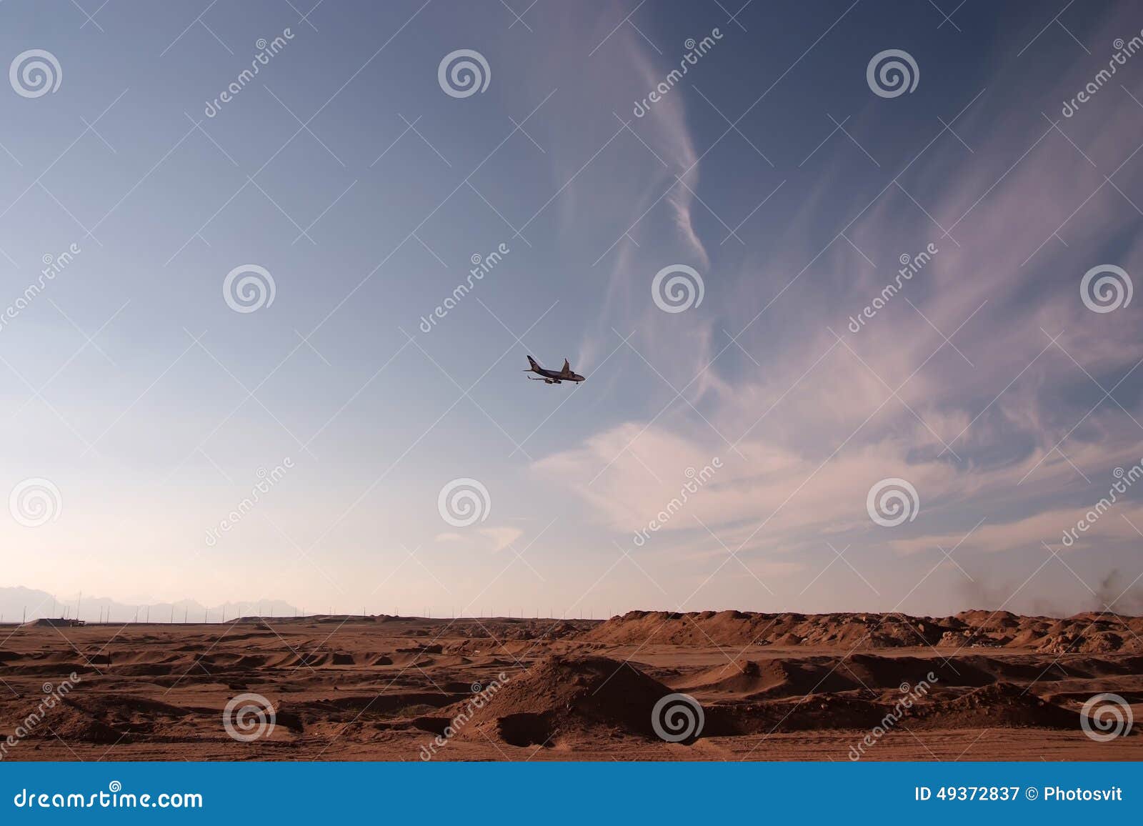 Plane over desert stock image. Image of cirrus, desert - 49372837