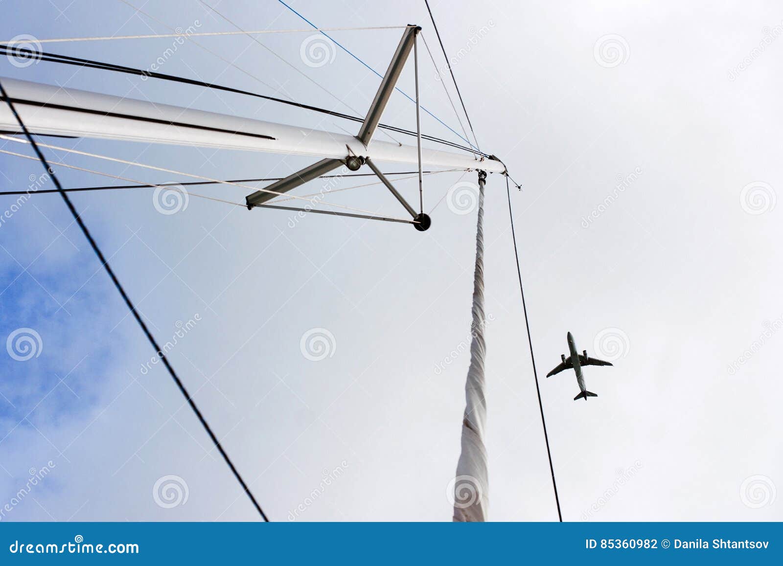 Plane over the mast stock photo. Image of means, interent - 85360982