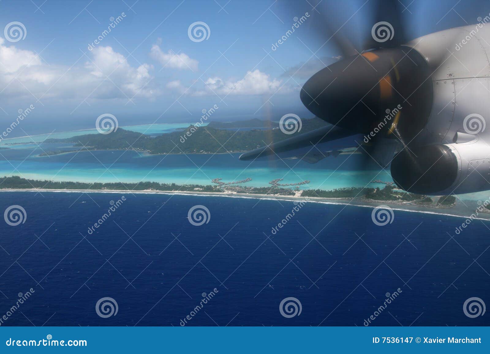Plane over pacific island stock image. Image of tahiti - 7536147
