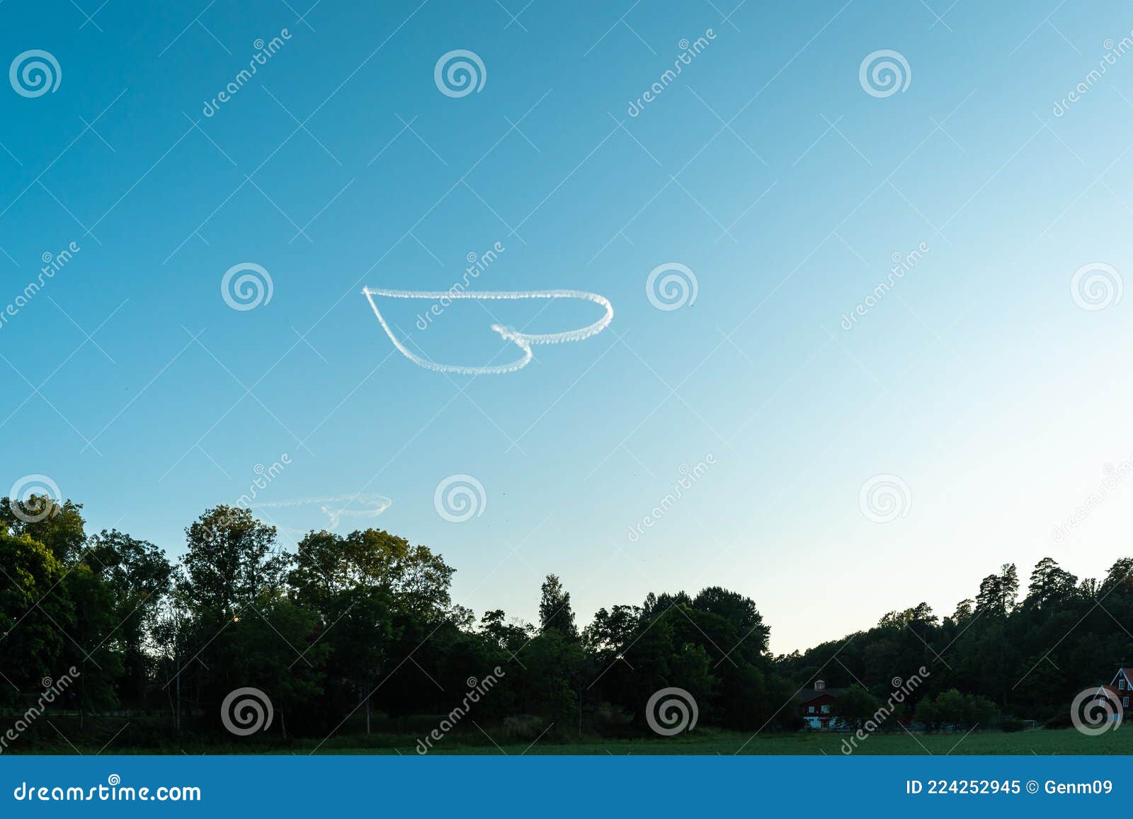 The Plane Painted Heart on the Blue Sky. Beautiful Patterns in the Form ...