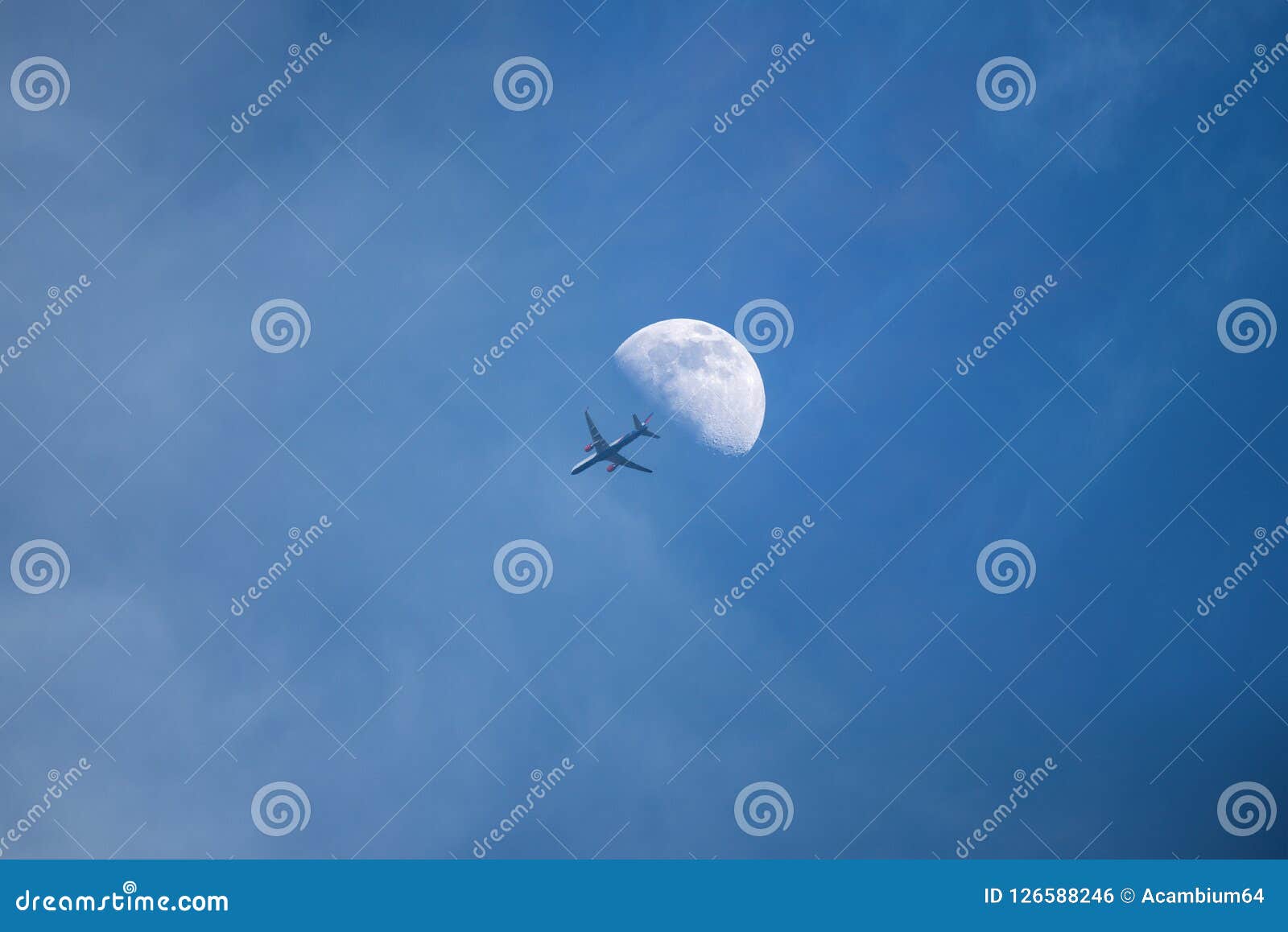 Plane Passing through the Moon from Bottom View with Long Conden Stock ...