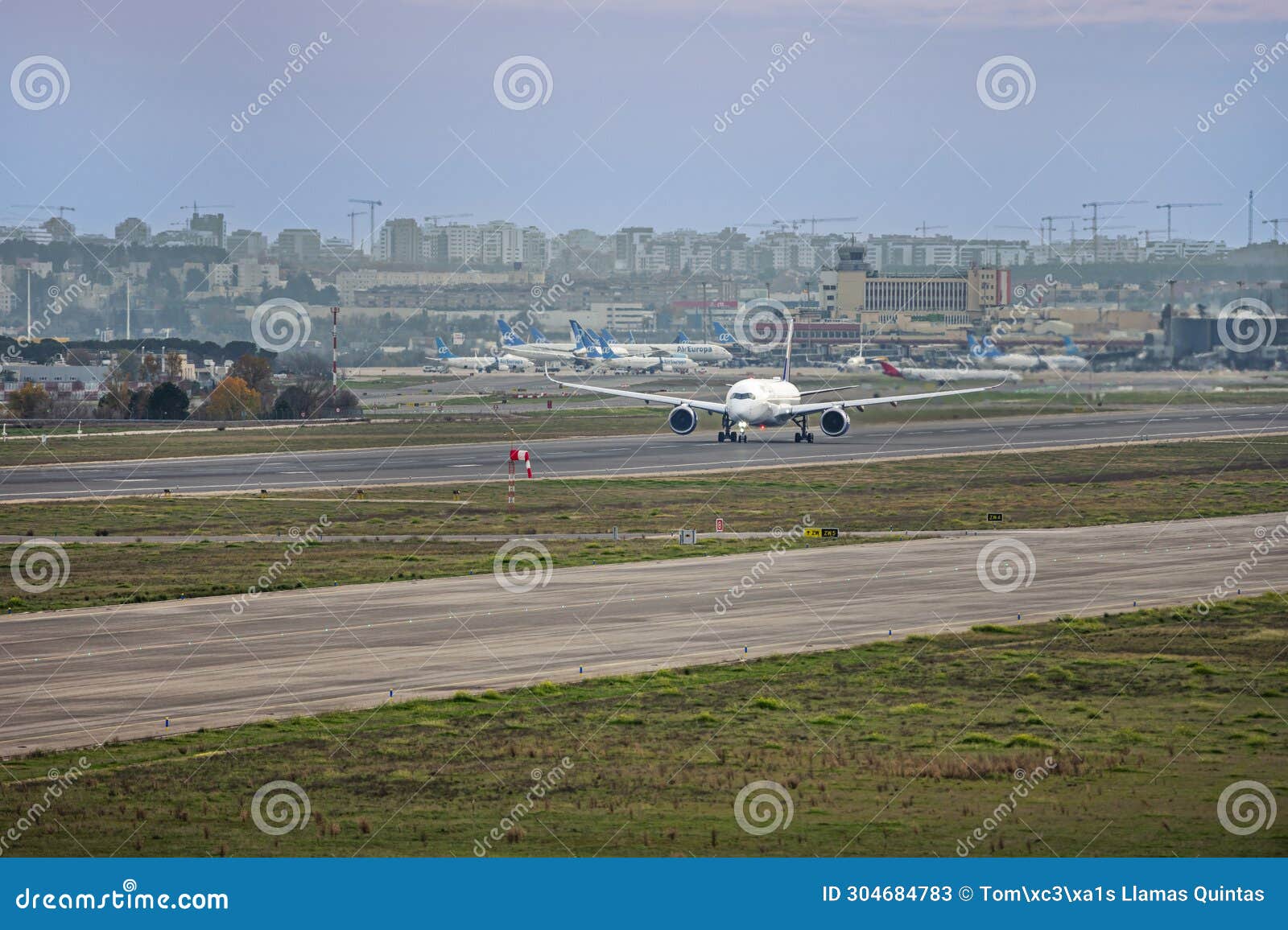 A Plane Running Down the Runway about To Take Off Stock Image - Image ...