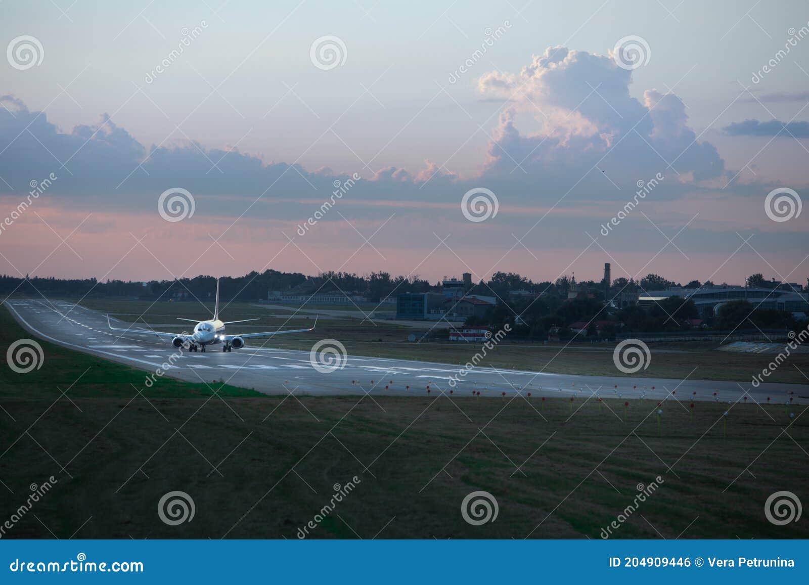 Plane on runway on sunset stock photo. Image of design - 204909446