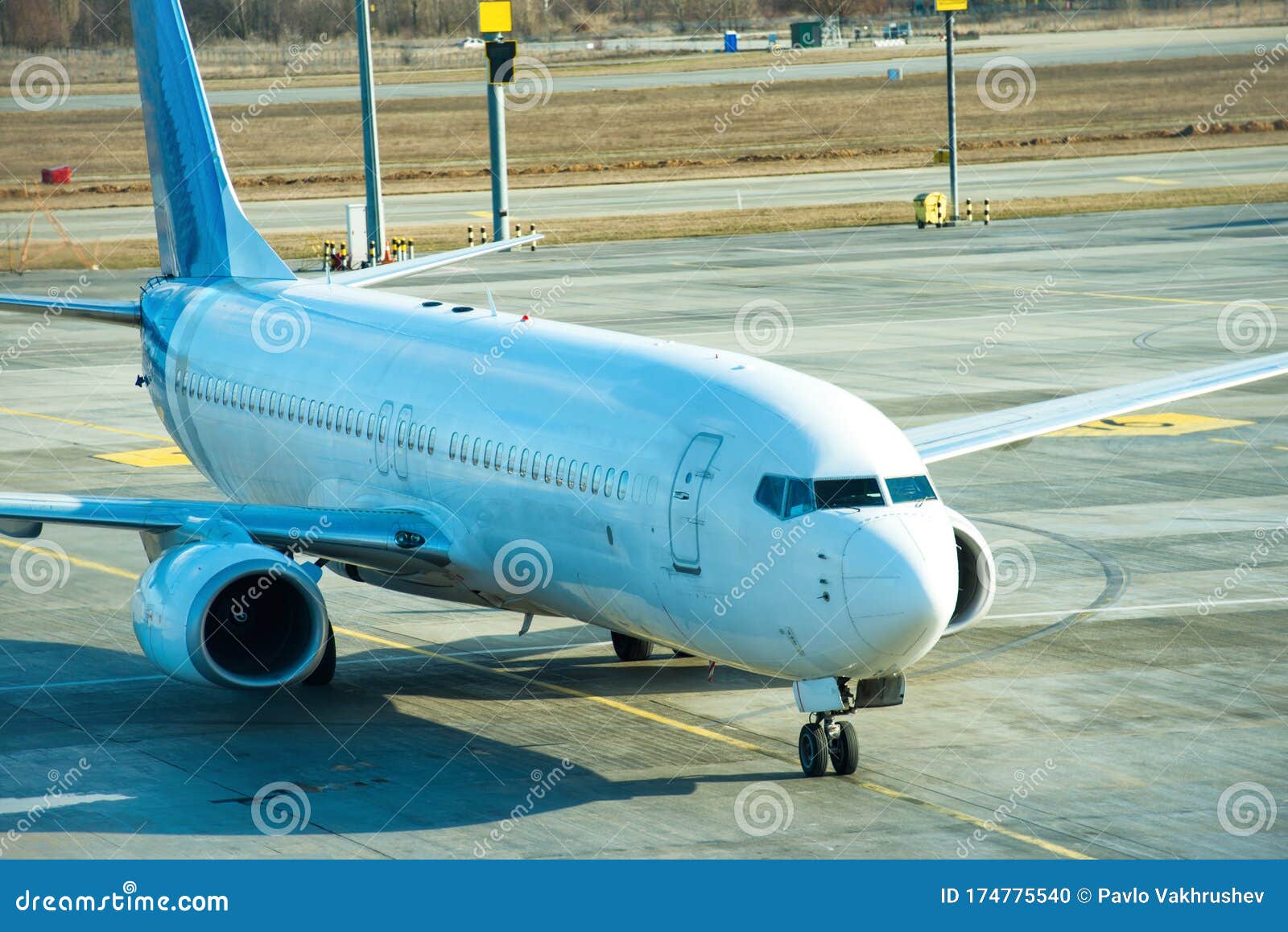 Plane standing on runway stock photo. Image of arrival - 174775540