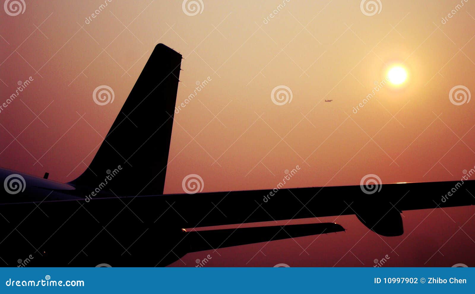Plane in the sun stock photo. Image of sunrise, sunset - 10997902