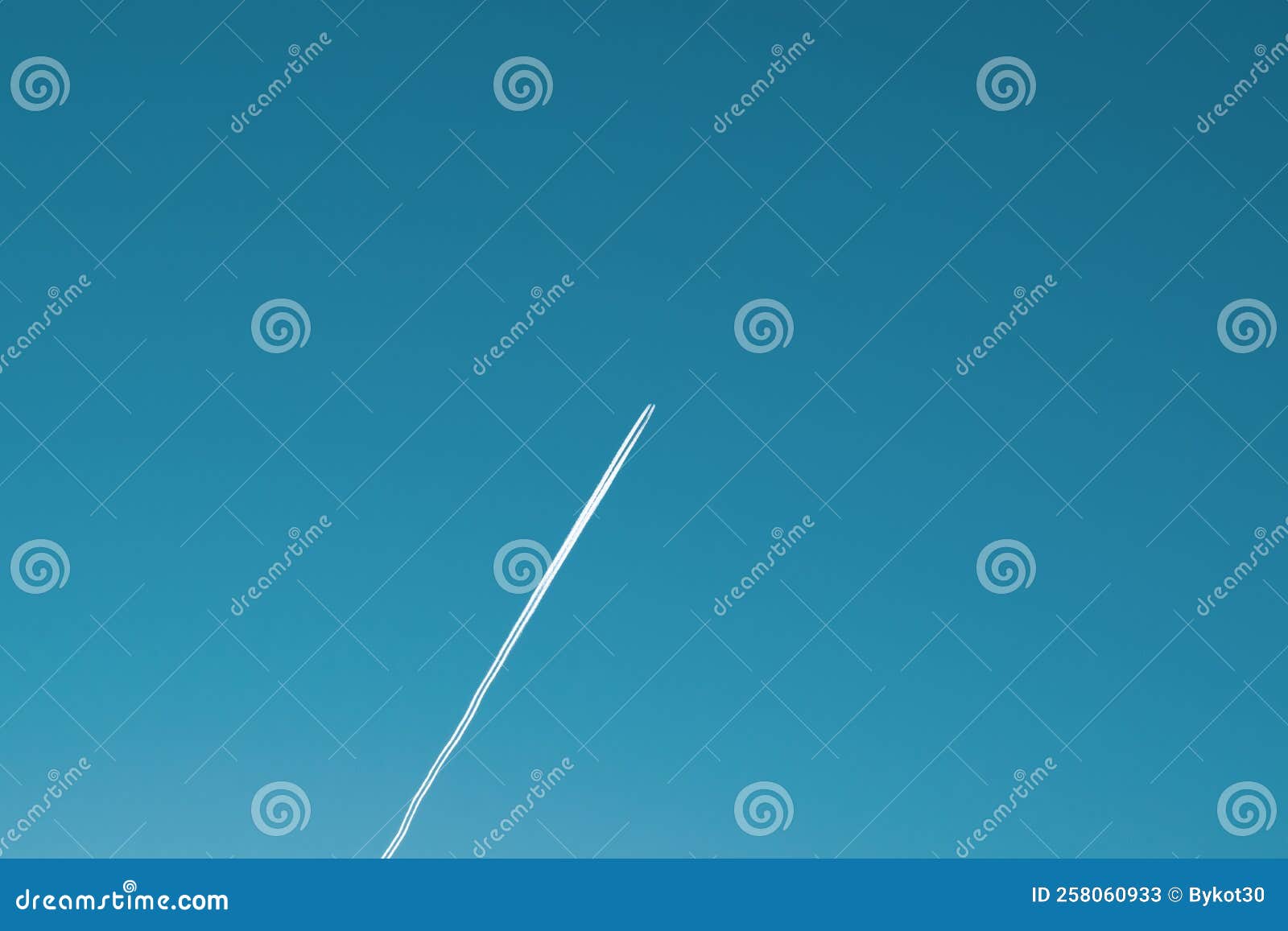 White Trail from the Plane Against the Blue Sky. Stock Image - Image of ...