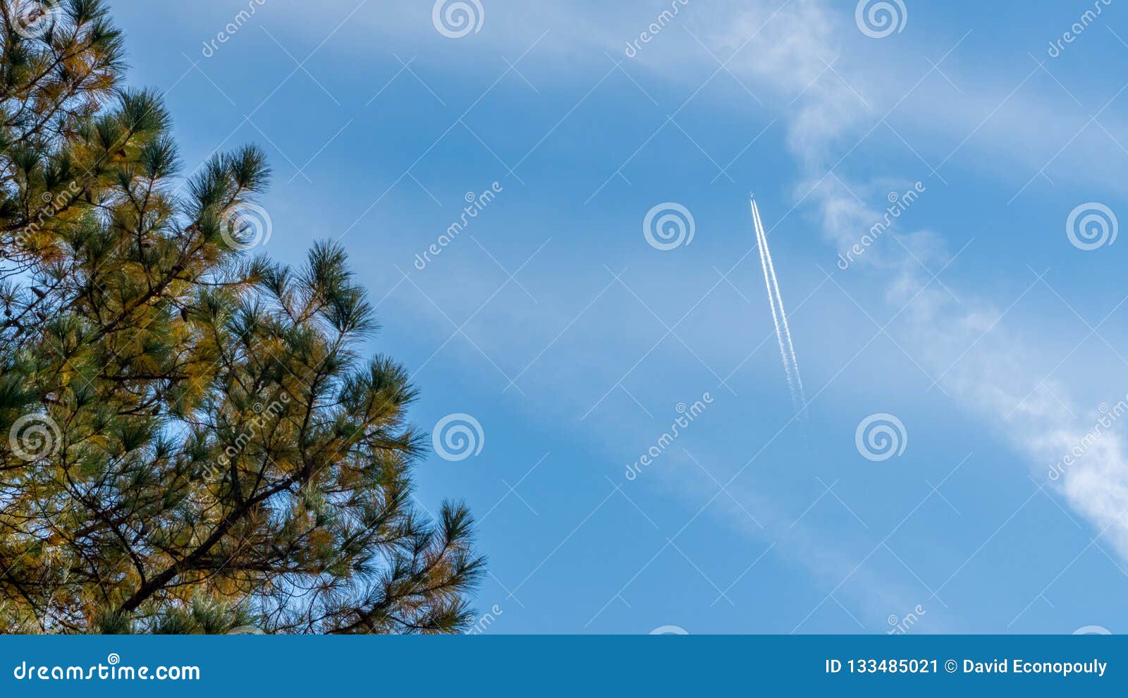 Plane with Trails Flying Hign in Sky Stock Image - Image of flying ...