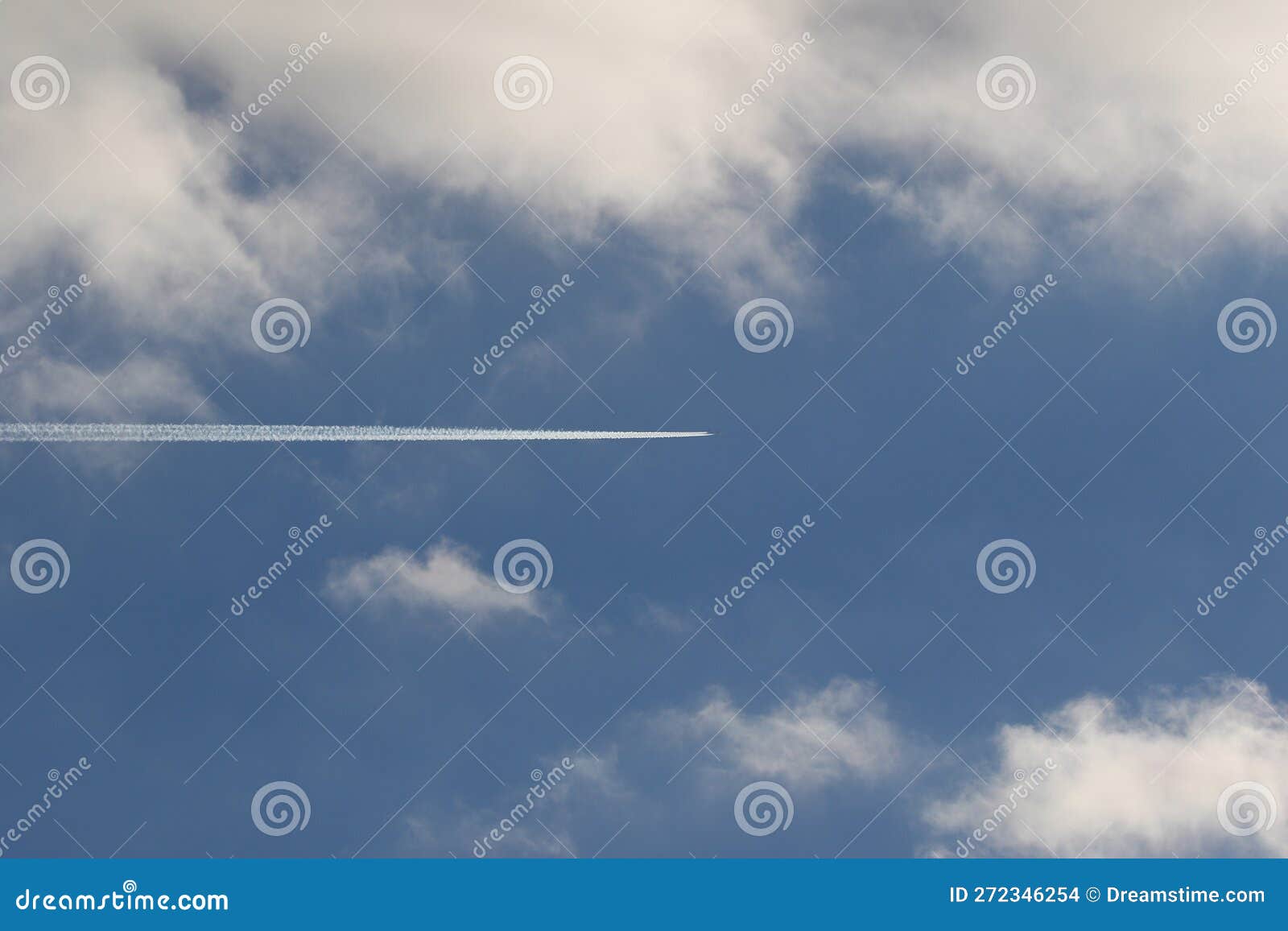 A Plane and Vapor Trails in the Sky Stock Photo - Image of power ...
