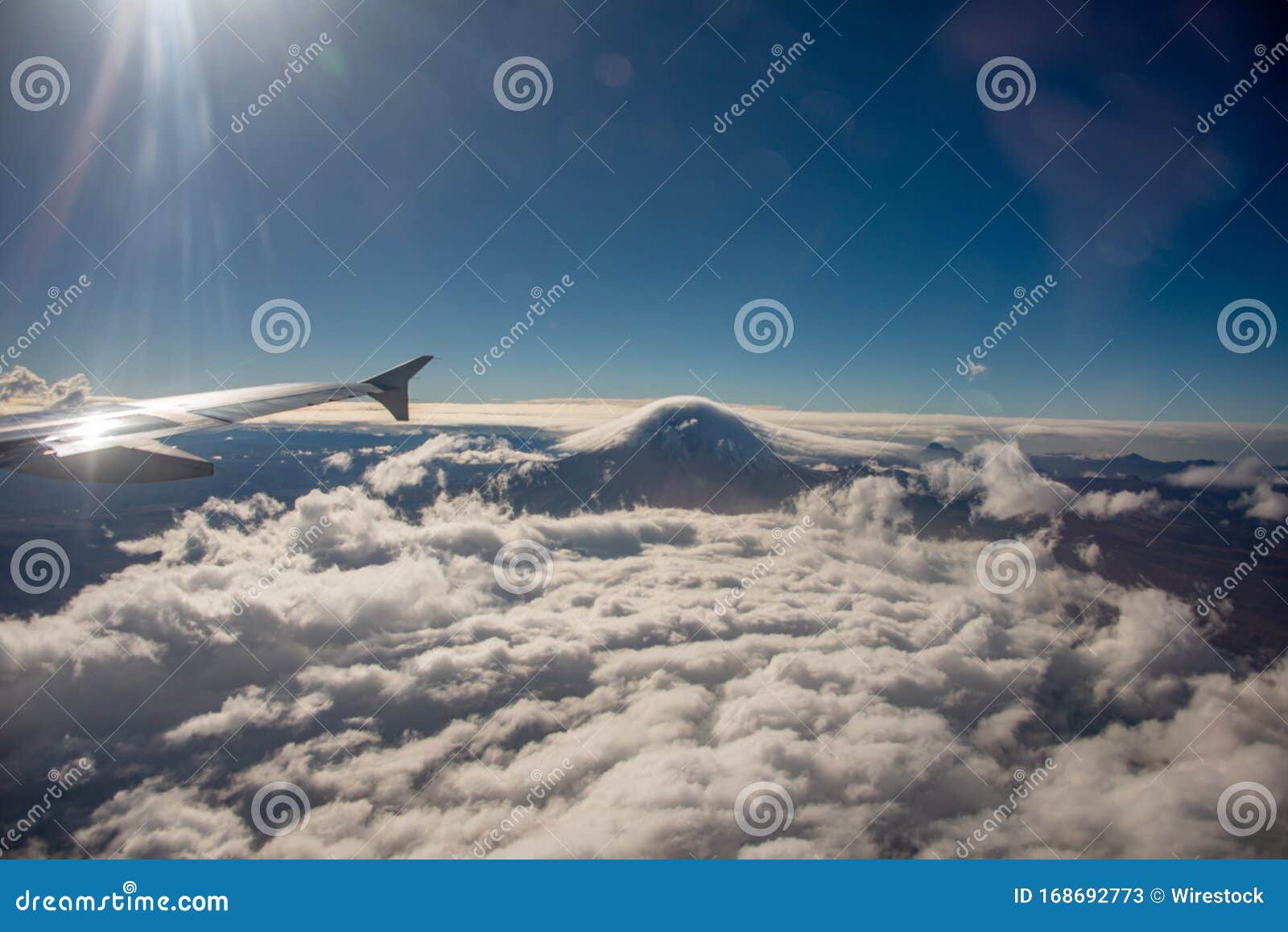 Plane View of Clouds Under a Blue Sky and Sunlight - a Cool Picture for ...