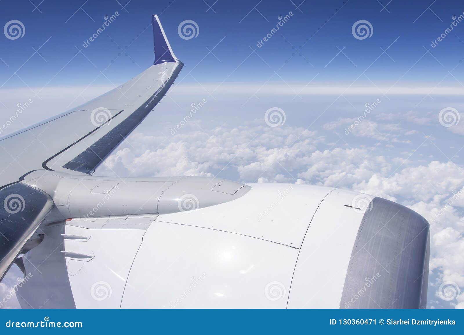 Plane Wing in Blue Sky. Looking through Window Aircraft during Flight ...