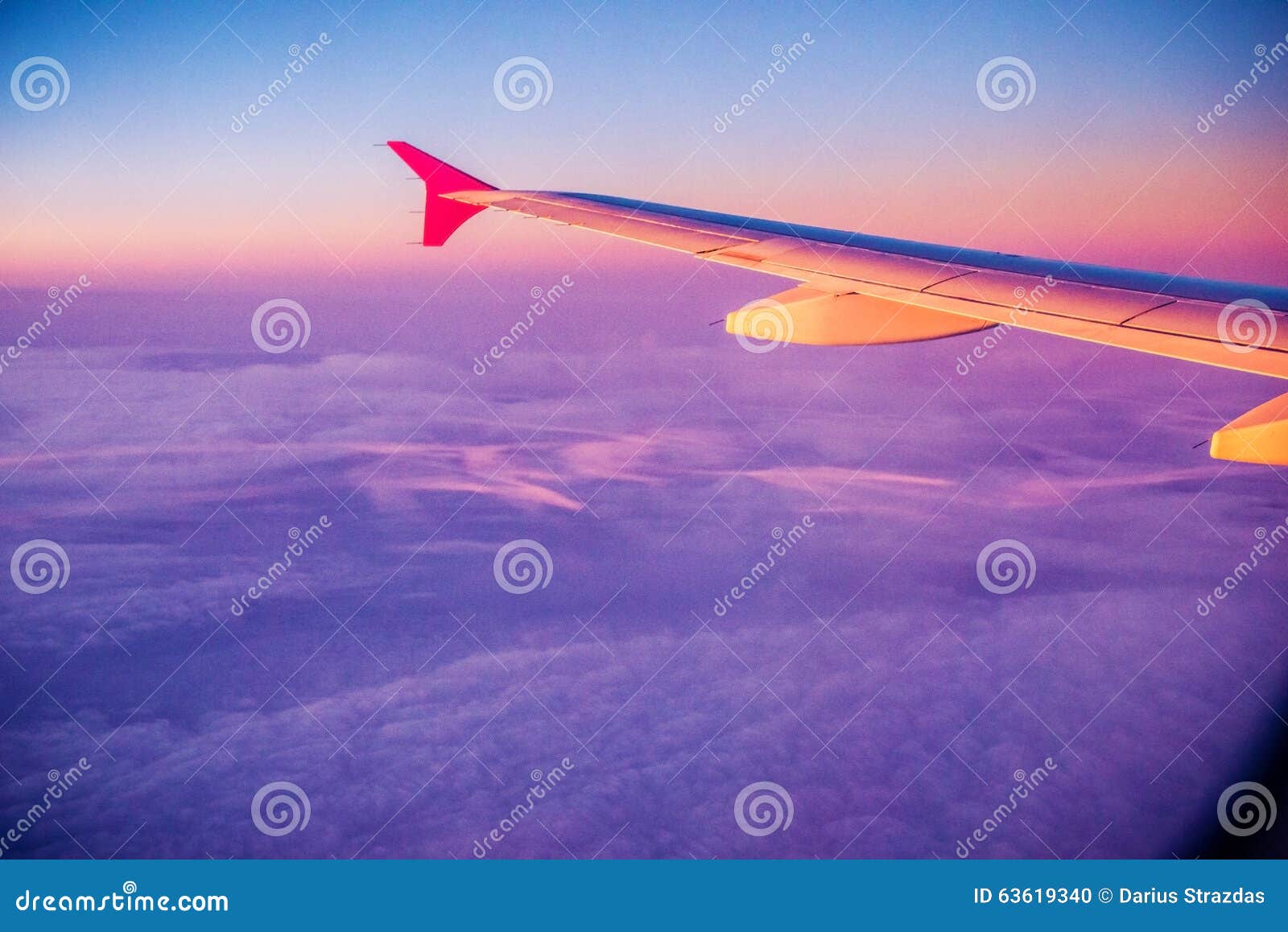 Plane wing at sunset stock photo. Image of earth, high - 63619340