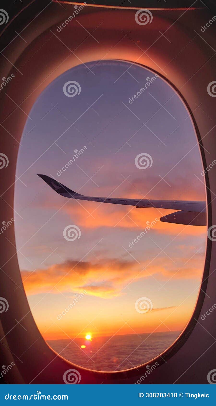 Plane Wing through the Window in a Sunset Editorial Stock Photo - Image ...