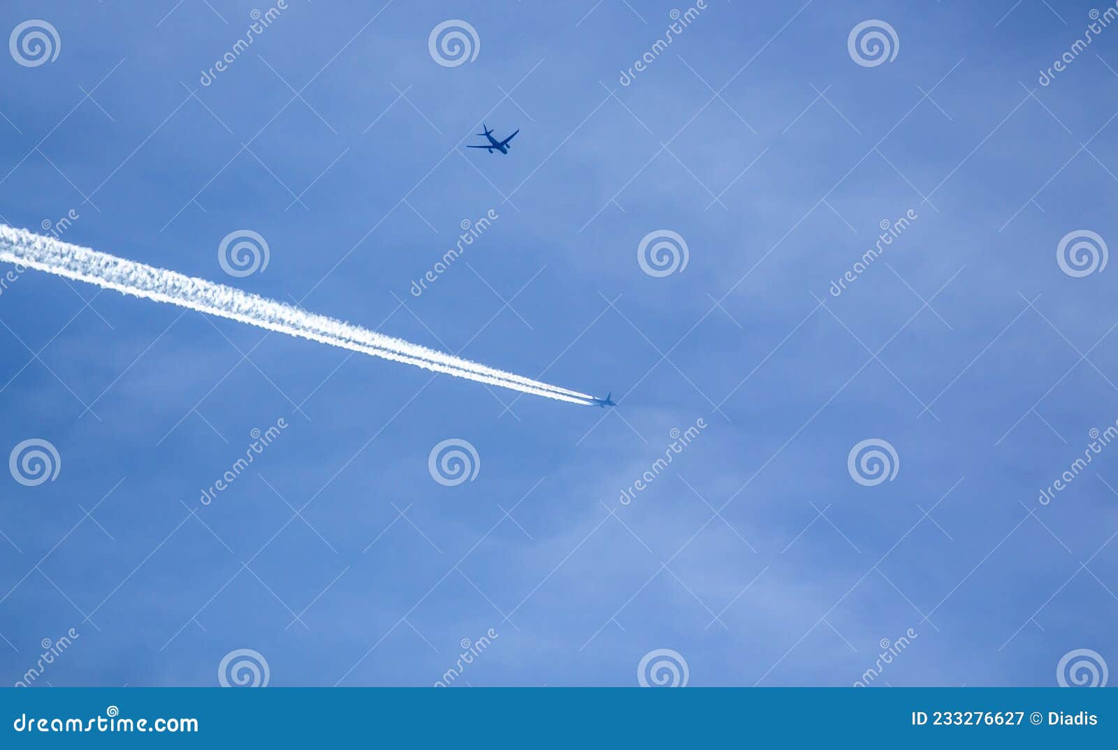 Planes cross in the sky stock image. Image of plane - 233276627