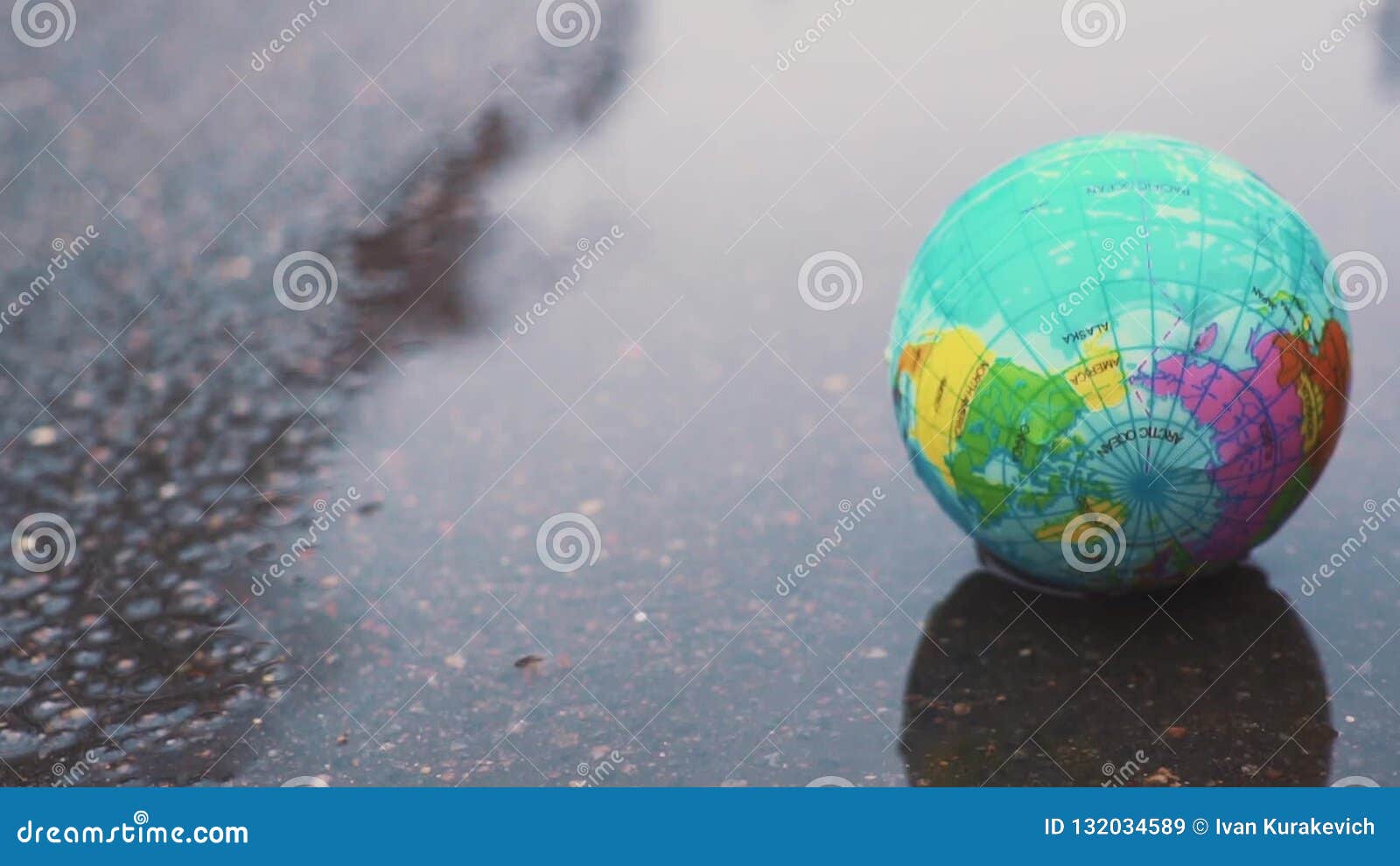 Planet Earth Beautiful Falls into a Muddy Puddle. Concept on ...