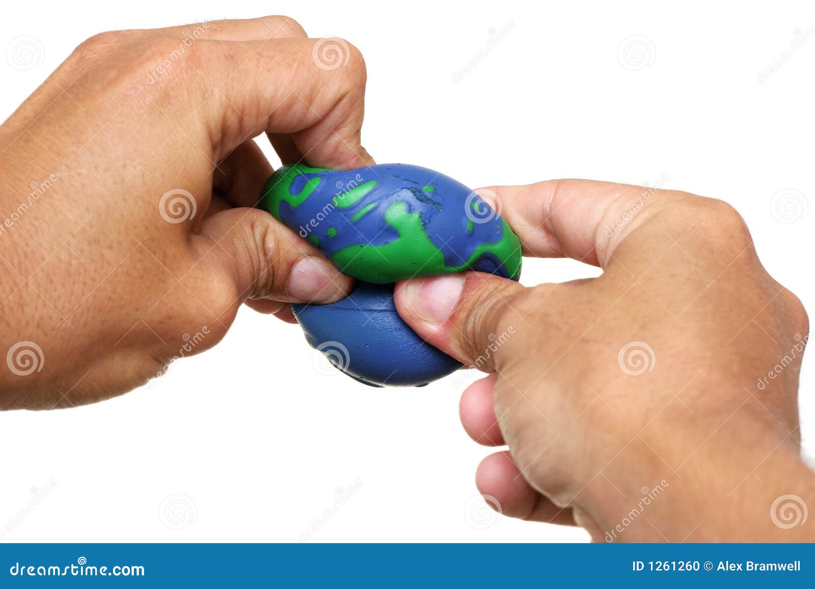 Hand Squeezing The World Stock Photo | CartoonDealer.com #20845044