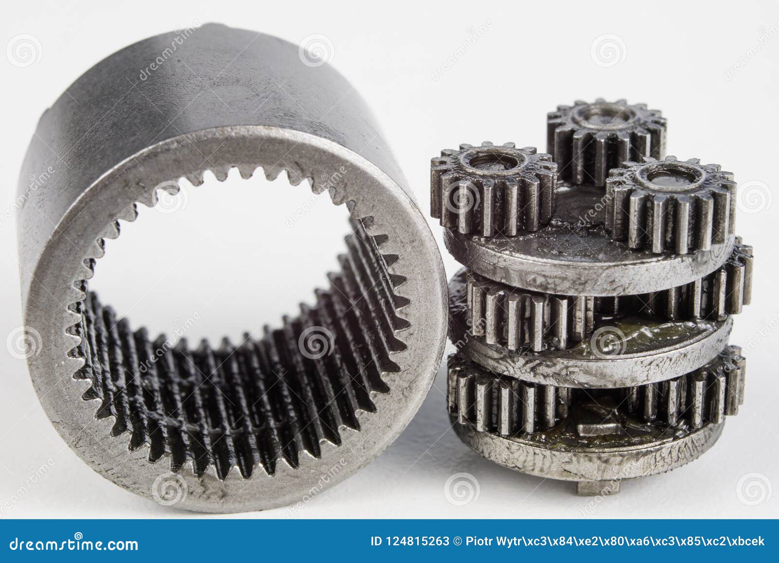 Planetary Gear from a Small Device on a Bright Table. Gear Wheel Stock ...