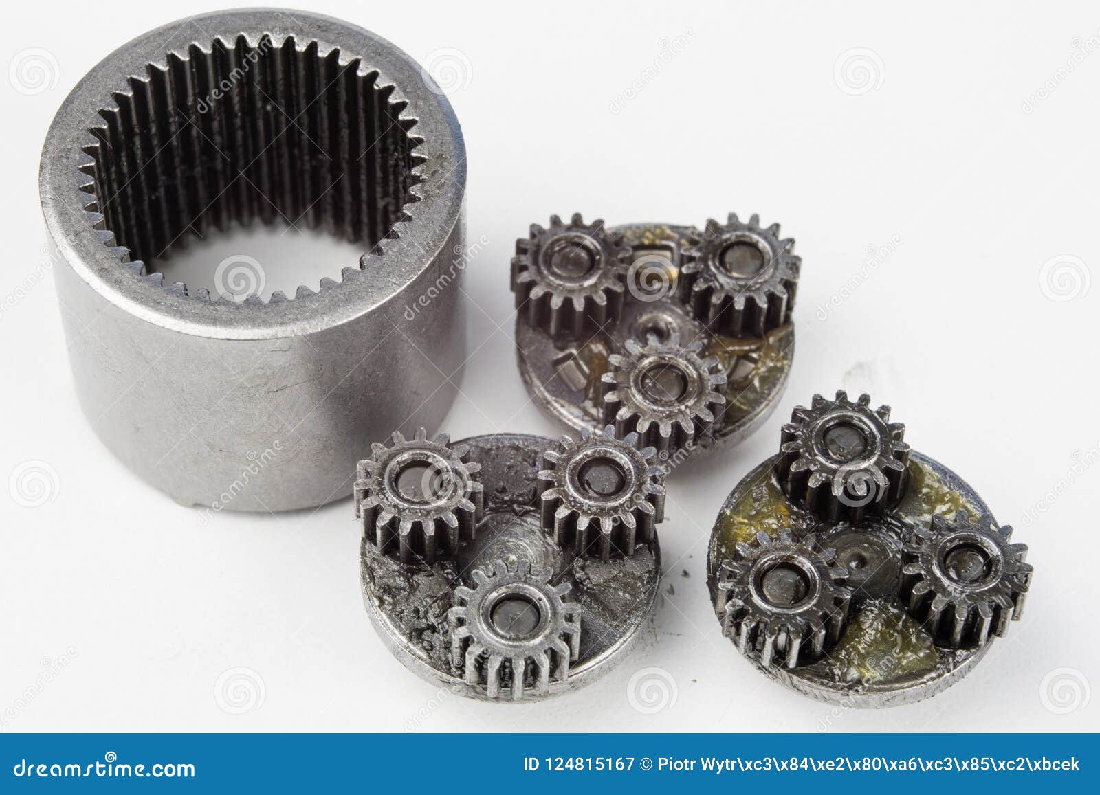 Planetary Gear from a Small Device on a Bright Table. Gear Wheel Stock ...