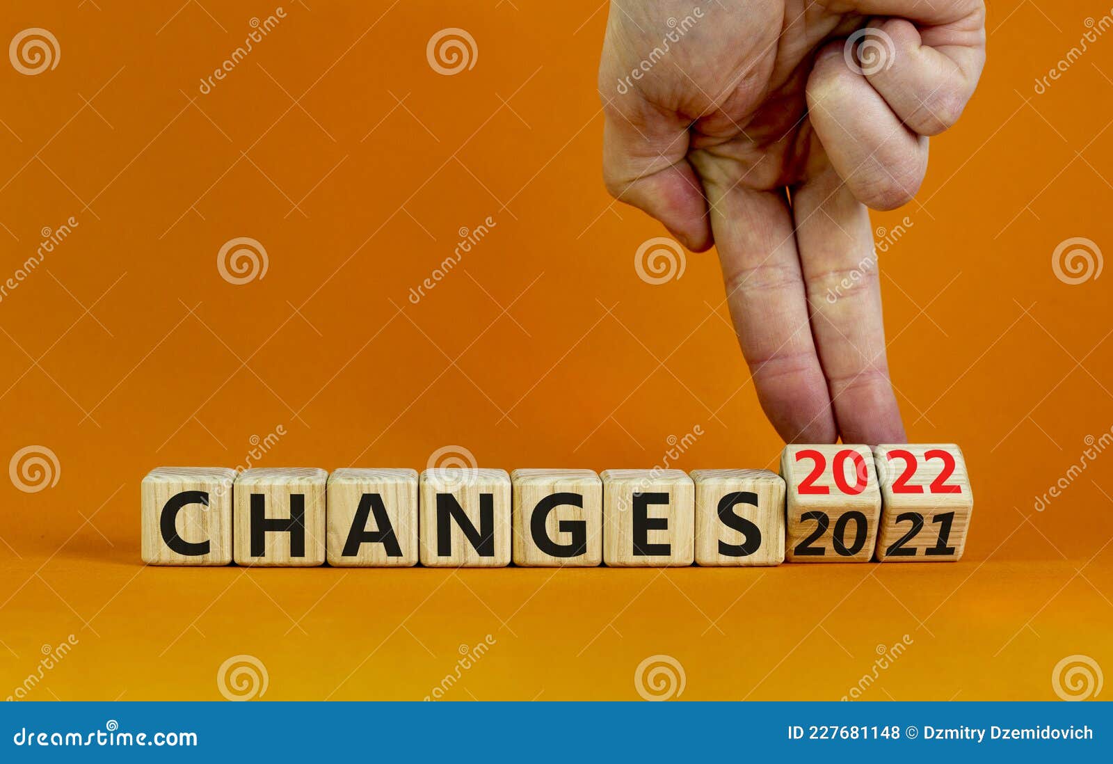 Planning 2022 Changes New Year Symbol. Businessman Turns a Wooden Cube ...